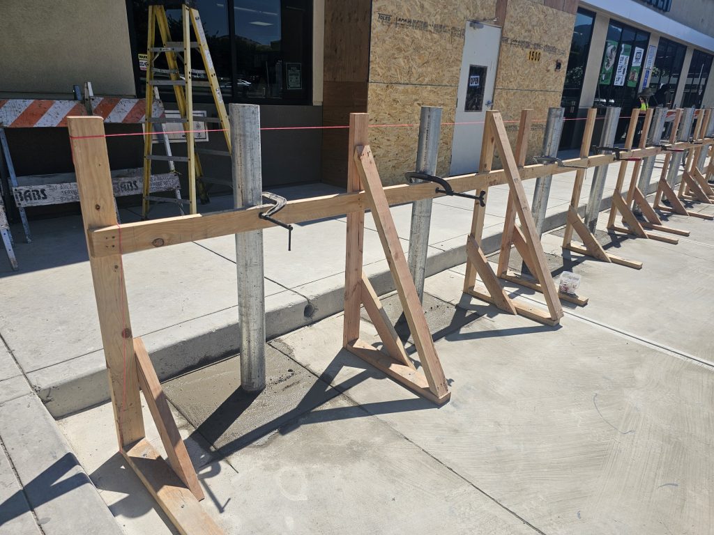 Vehicle Barrier Bollards Being Installed In Front Of 7-Eleven On ...